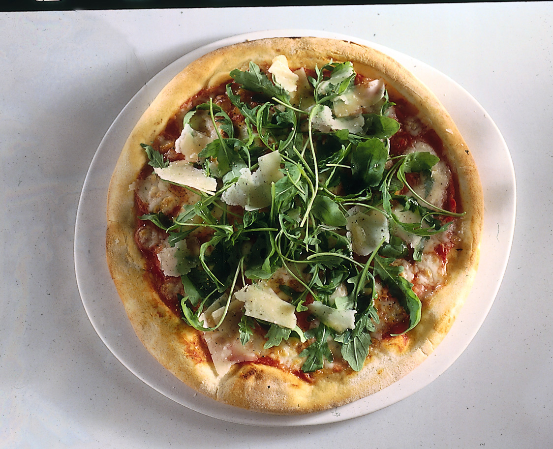 Ricetta Pizza con rucola e grana - Donna Moderna