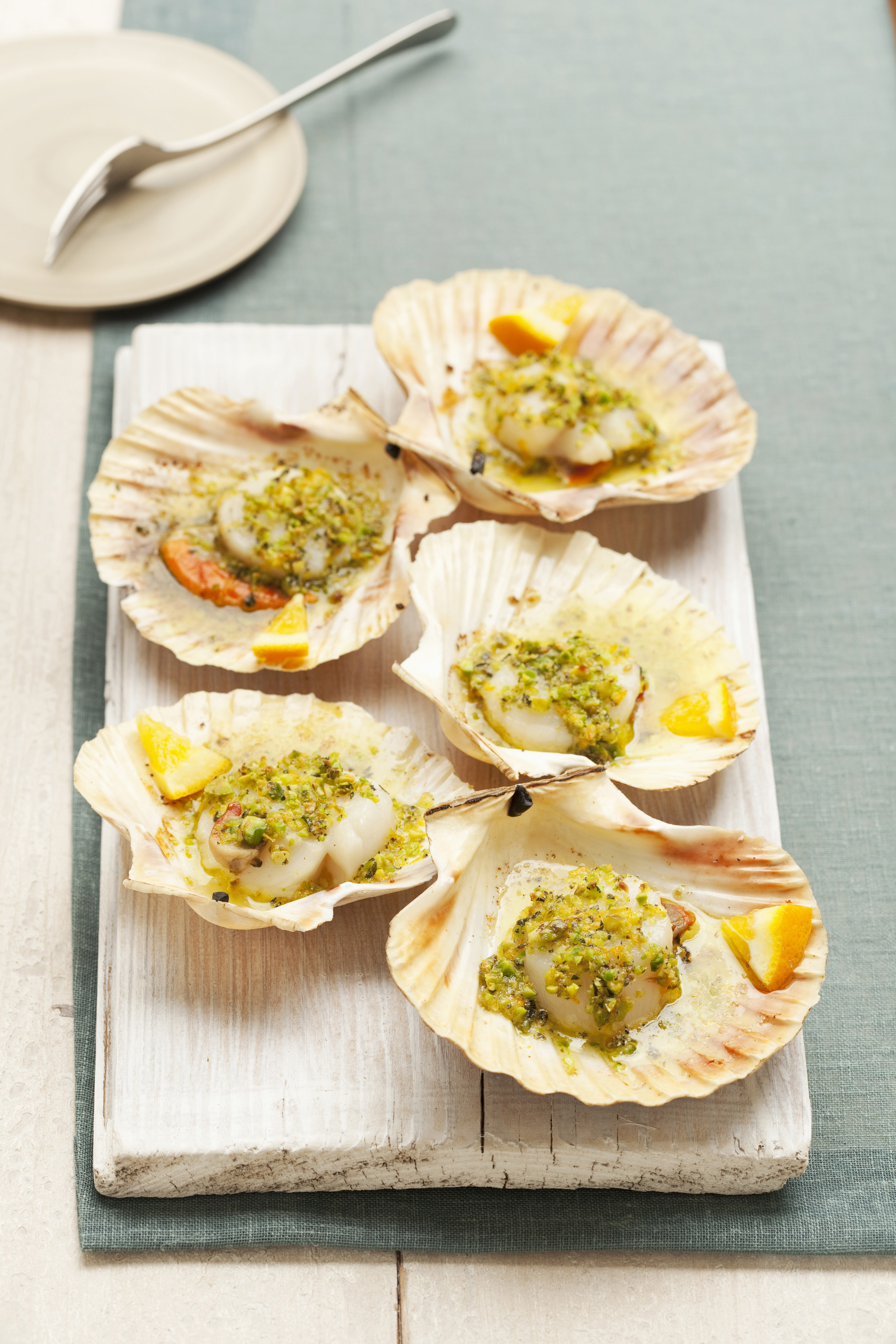 Ricetta Capesante all'arancia e pistacchi - Donna Moderna