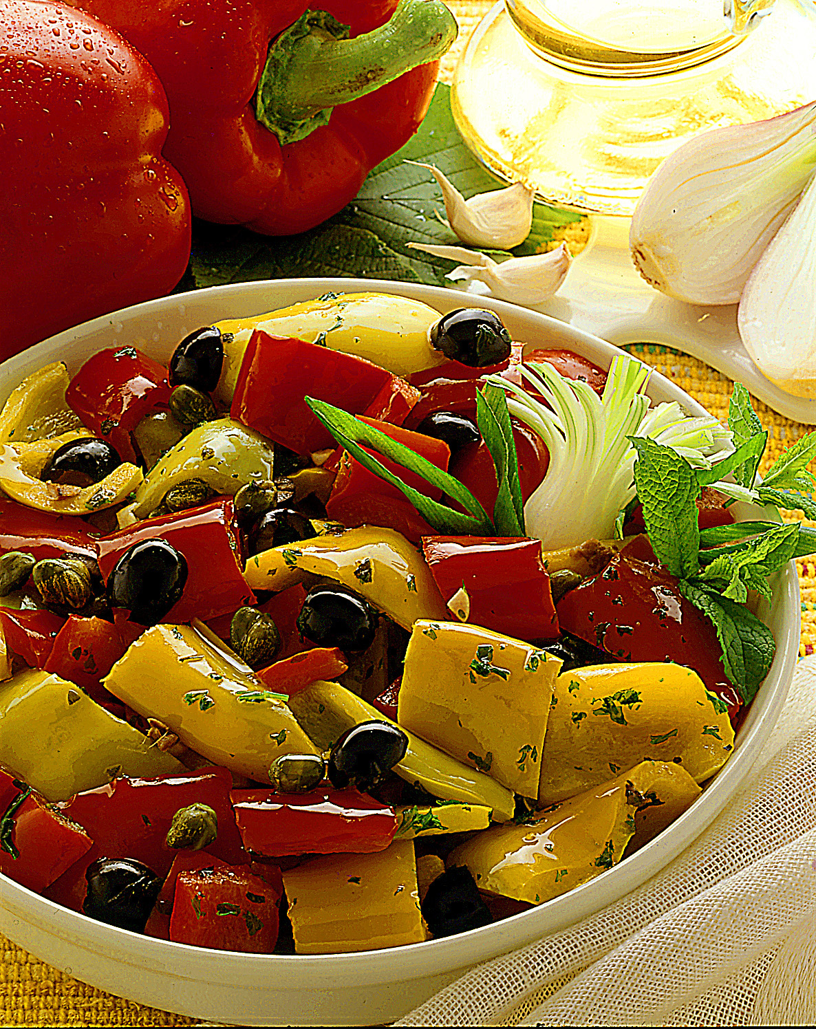 Ricetta Peperoni rossi e gialli alle acciughe - Donna Moderna